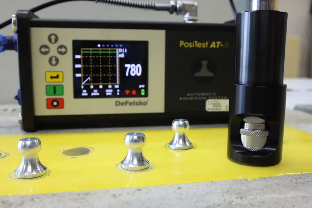 ASTM D4541 - Adhesion Capacity Test - Micom Laboratories